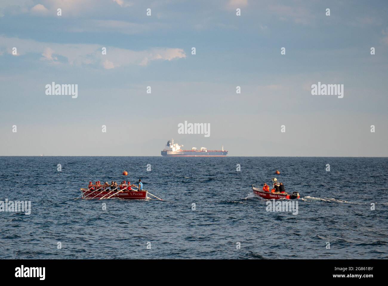 Red Rowing Boat with ten Oars during a Training in the Sea before a ...