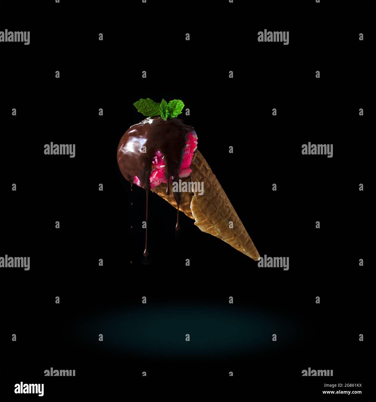 floating ice-cream cone with dripping chocolate Stock Photo - Alamy
