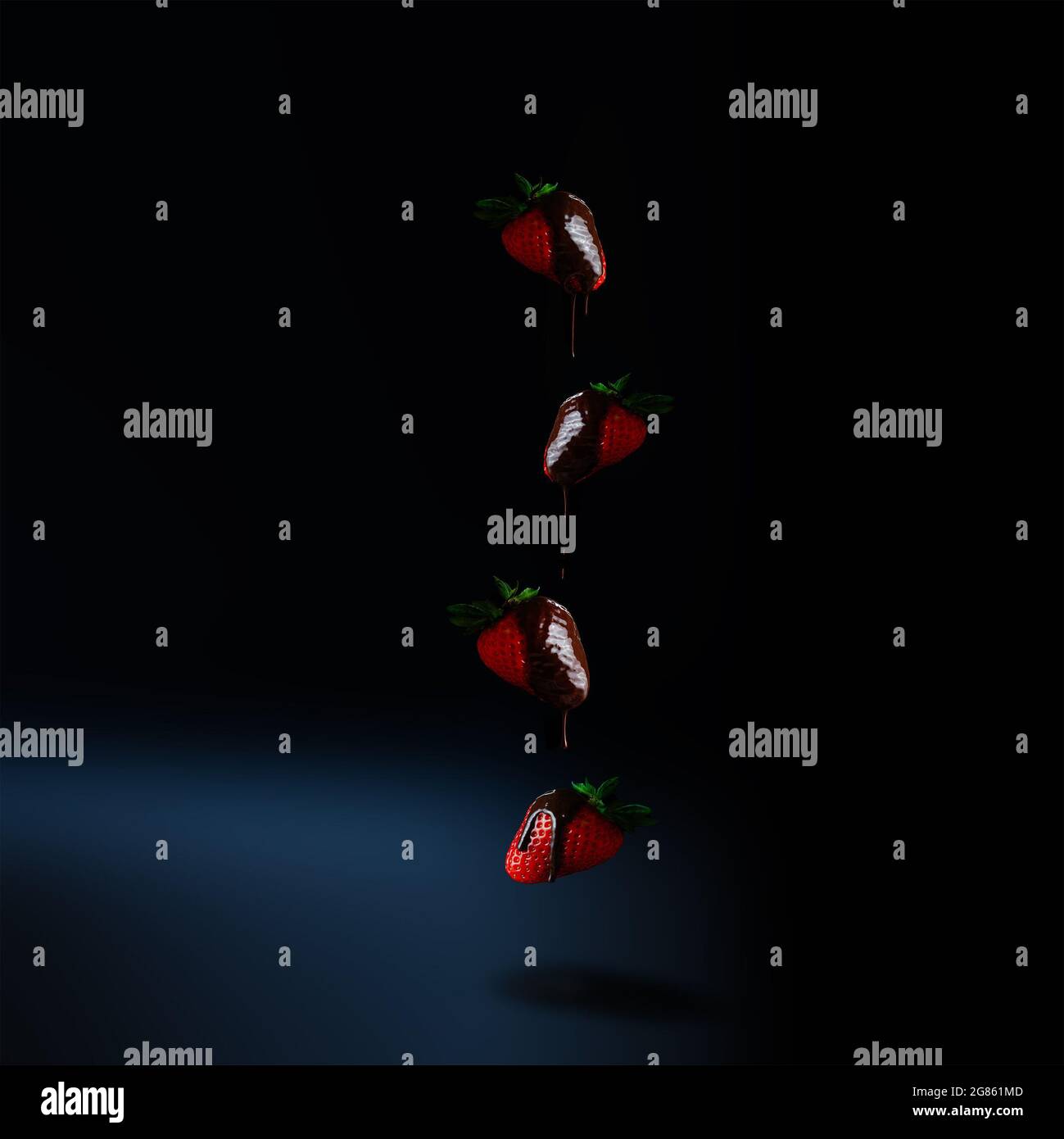 Floating strawberries with dripping chocolate Stock Photo - Alamy