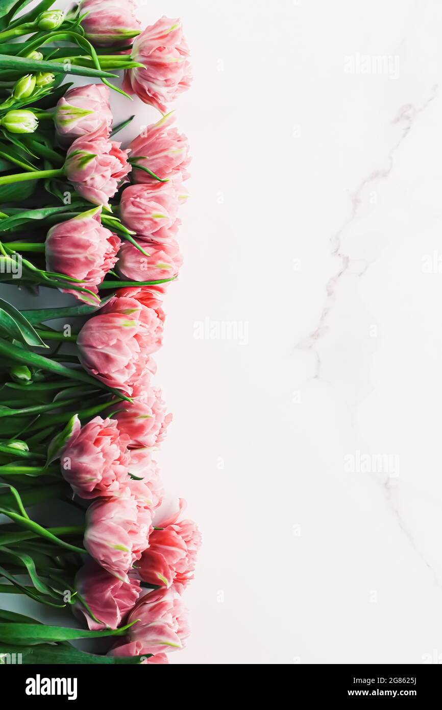 Spring flowers on marble background as holiday gift, greeting card and ...