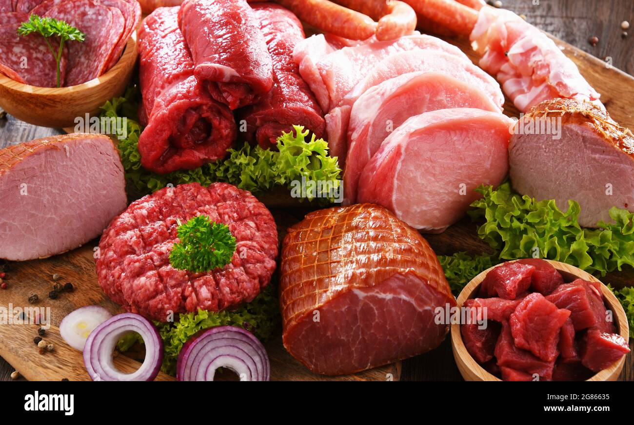 Composition with assorted meat products Stock Photo - Alamy