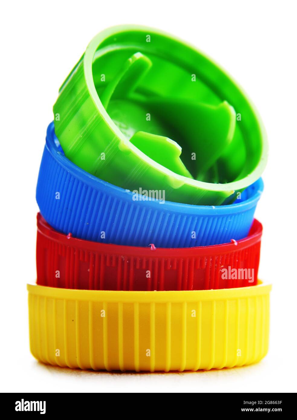 Colorful plastic bottle caps isolated on white. Recycling Stock Photo ...