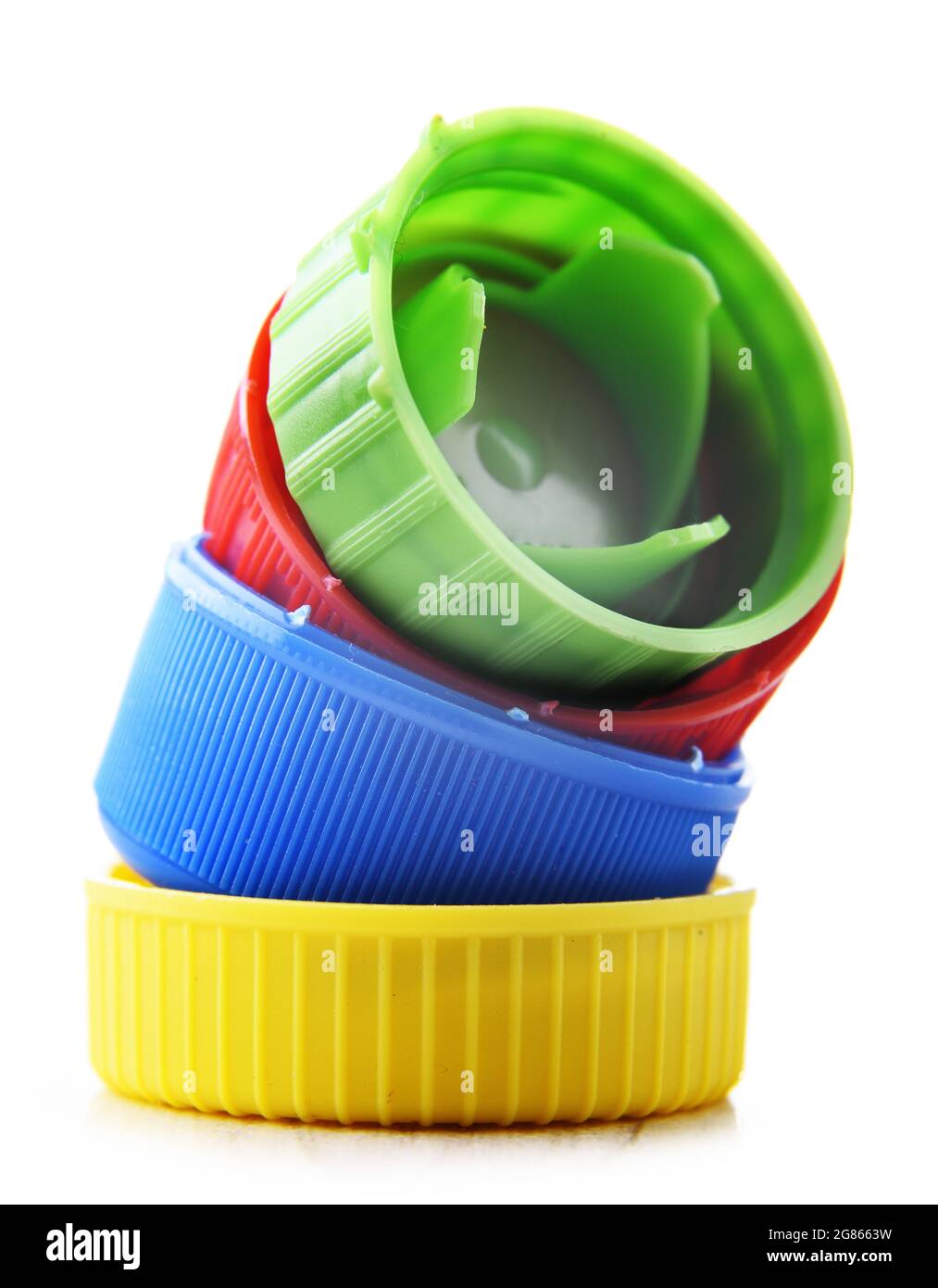 Colorful plastic bottle caps isolated on white. Recycling Stock Photo ...