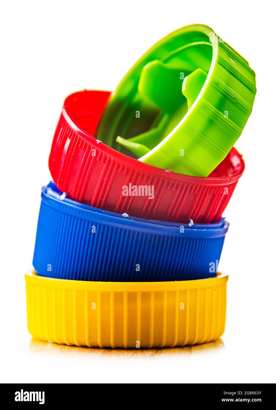 Colorful plastic bottle caps isolated on white. Recycling Stock Photo ...