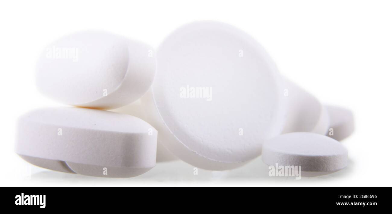 Composition with pharmaceutical drug pills over white background Stock ...