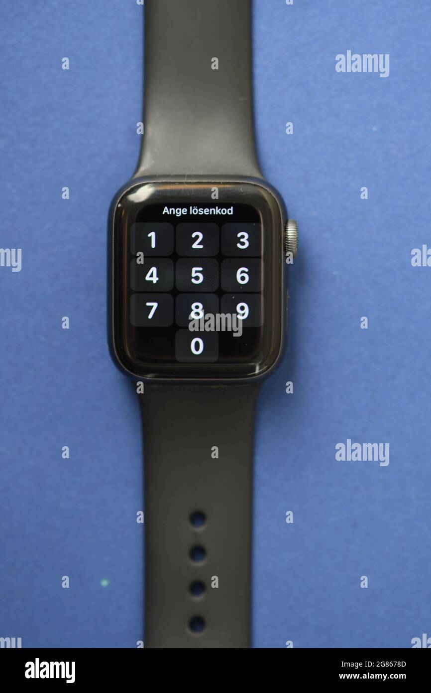 Overhead of a modern watch with touch screen on blue background Stock ...