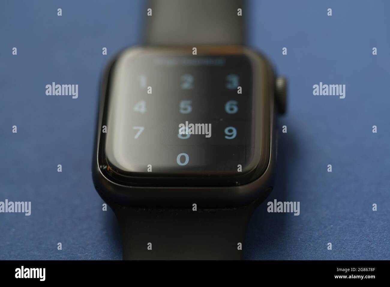 Closeup of a modern watch with touch screen on blue background Stock ...