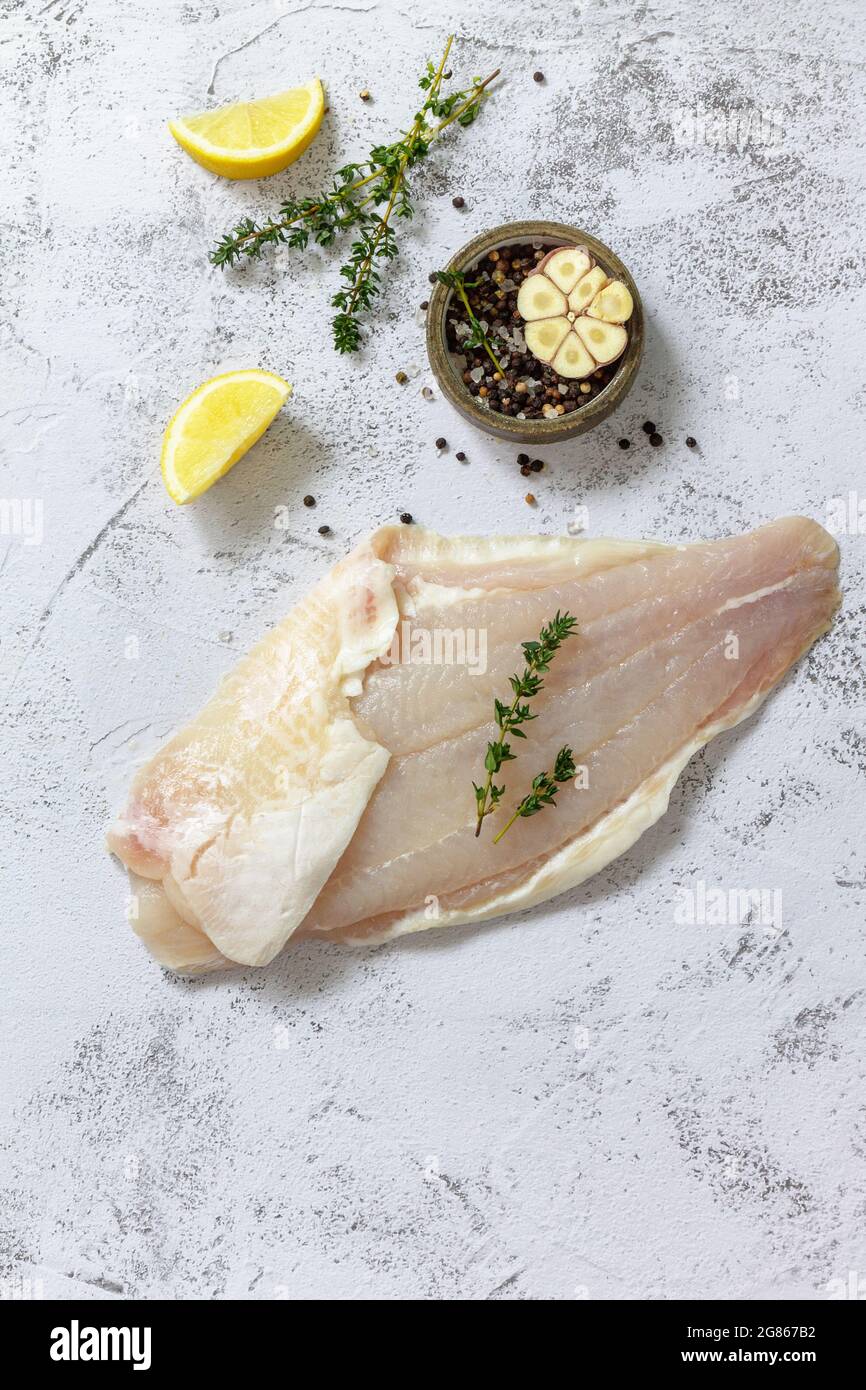 Seafood, raw white fish fillet for cooking. Fresh fillet Pangasius with ...