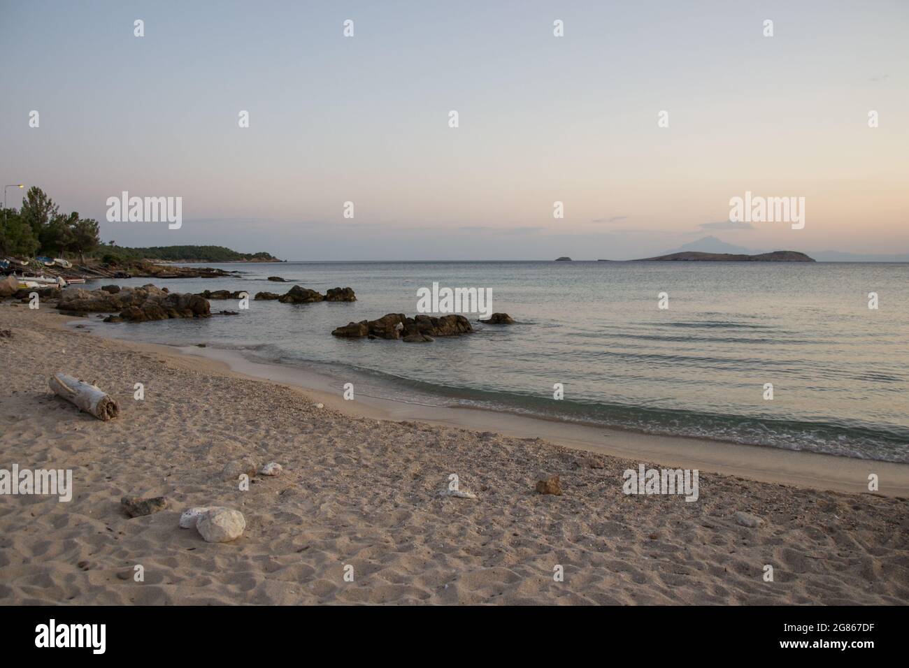 Small wild beach at sunset, beautiful natural scene, tranquil, calm ...