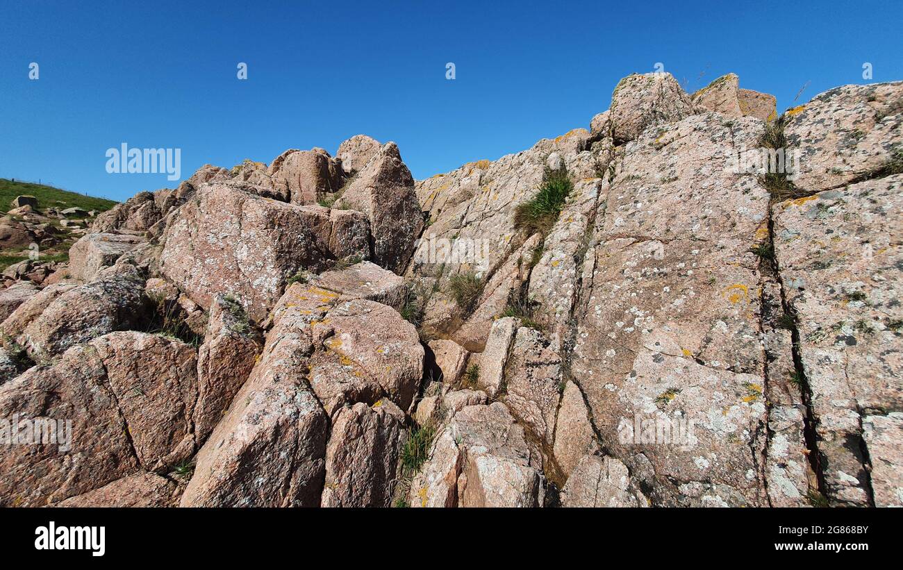 Granite rock formations and cliffs at Jeannie Greaves, Boddam ...