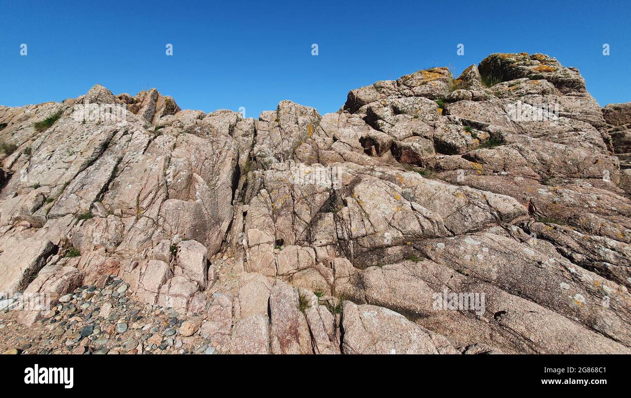 Granite rock formations and cliffs at Jeannie Greaves, Boddam ...