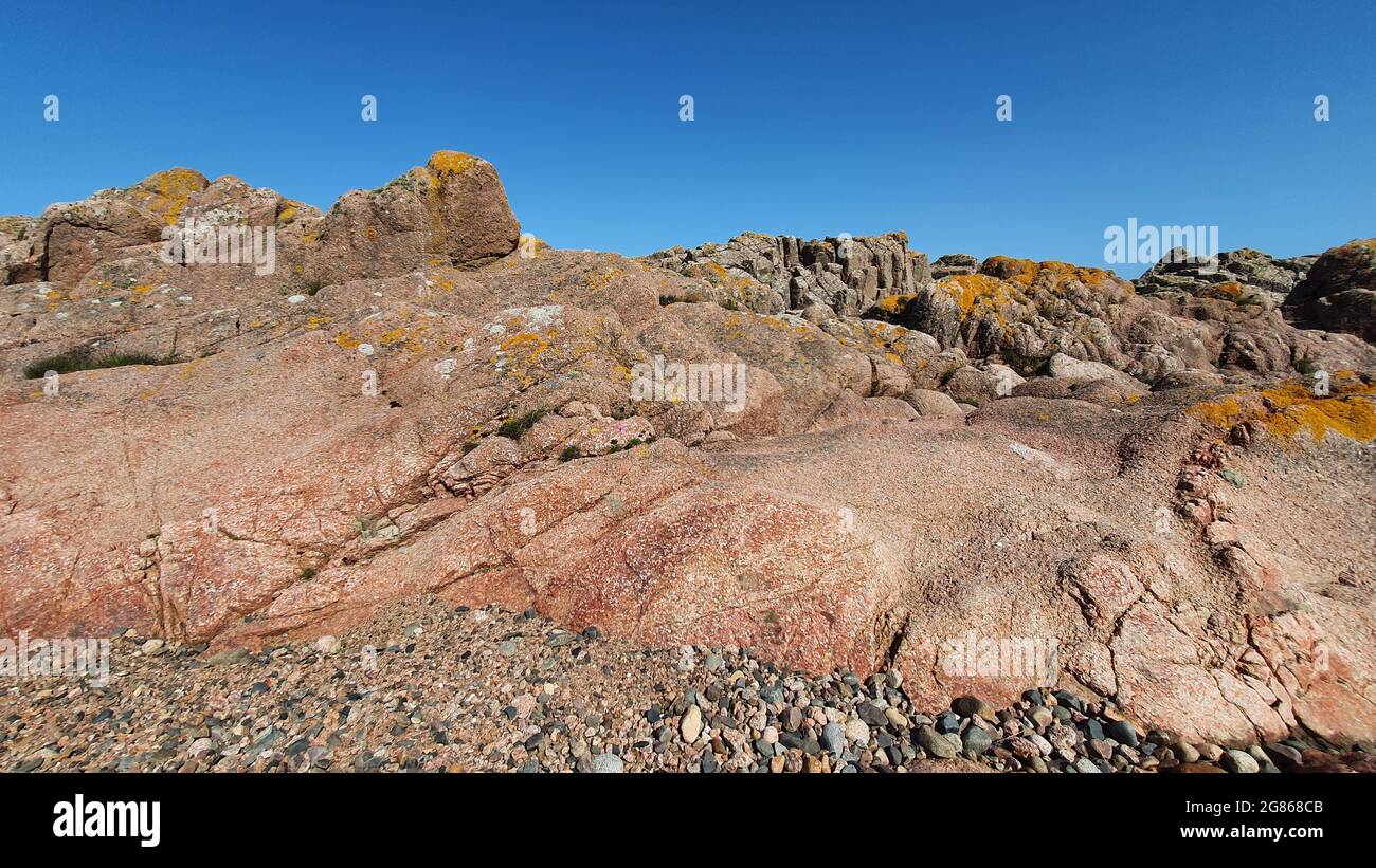 Granite rock formations and cliffs at Jeannie Greaves, Boddam ...