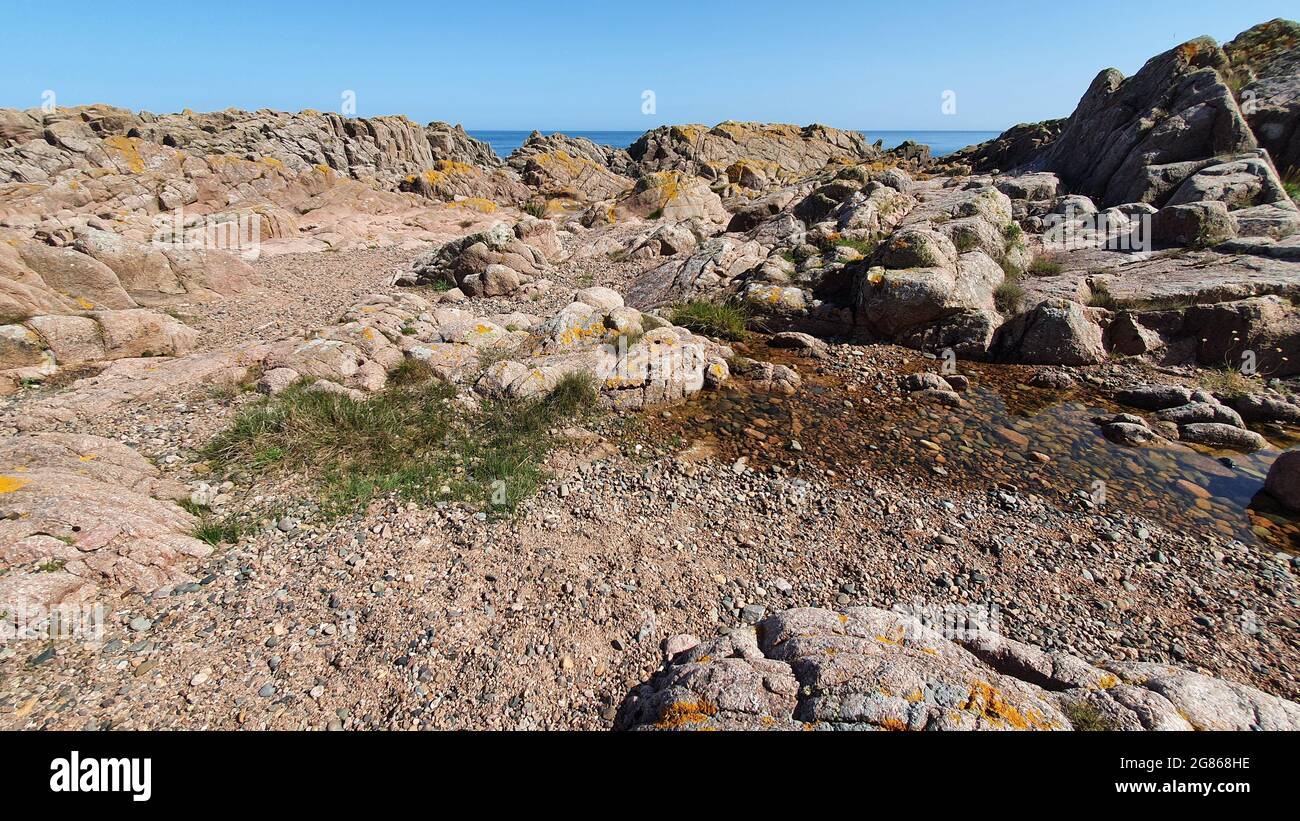 Granite rock formations and cliffs at Jeannie Greaves, Boddam ...