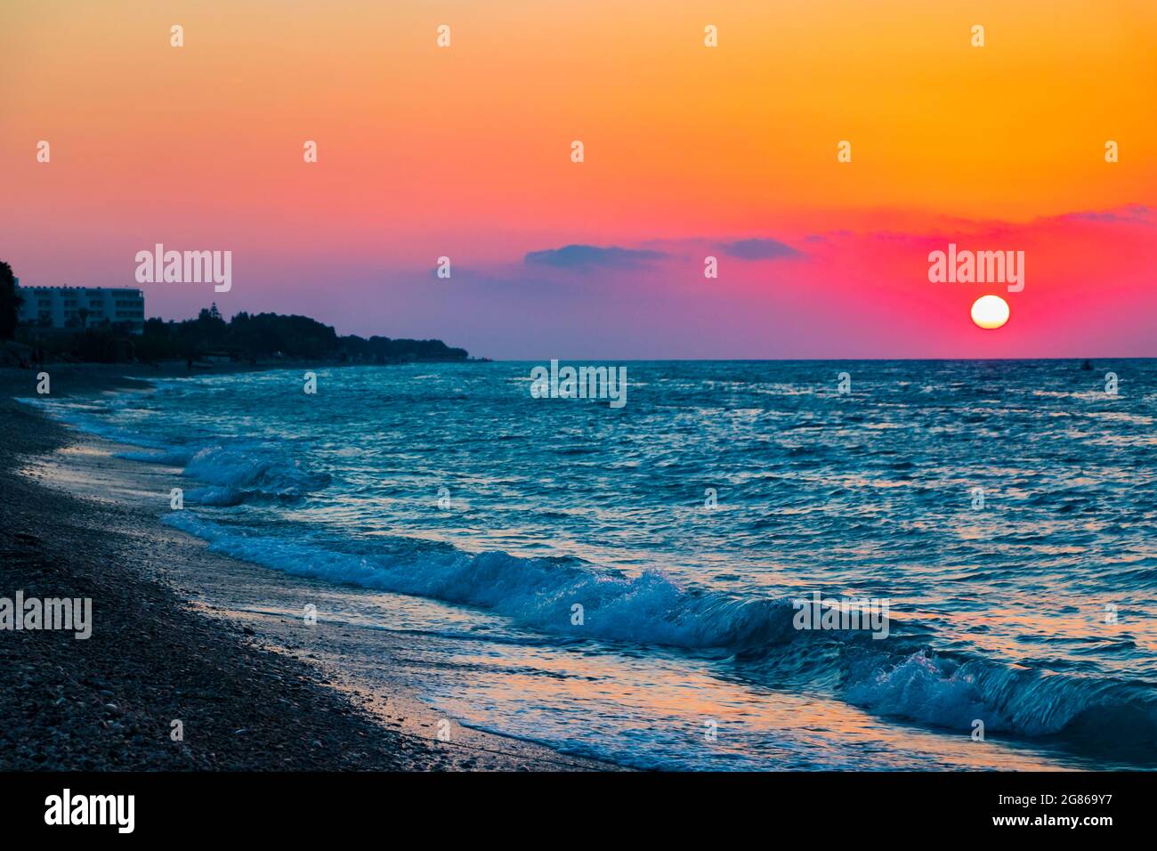 Rainbow colors of the most beautiful sunset at Ialysos Beach on Rhodes ...