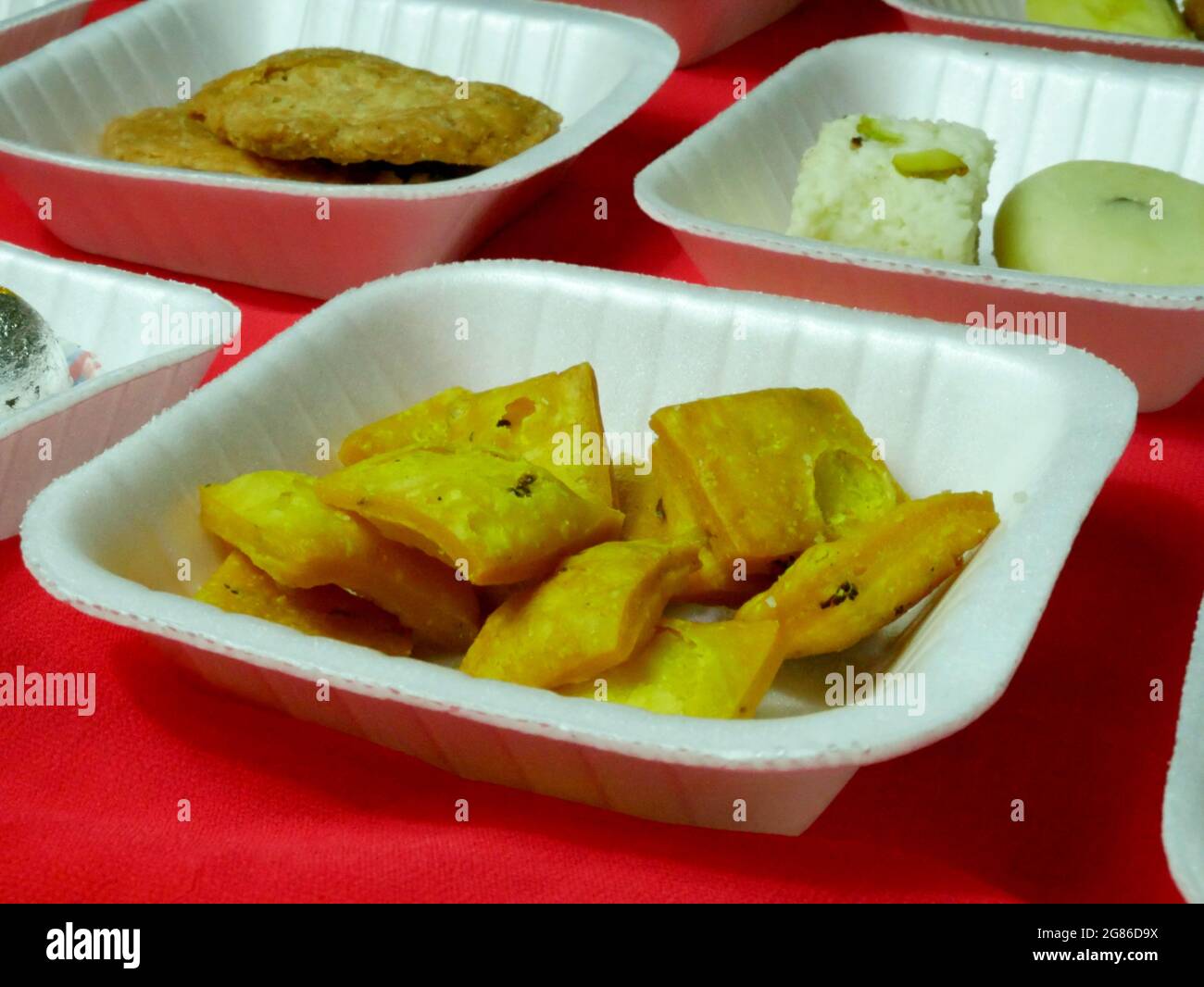 Indian traditional salty snacks made with gram flour, served on white ...