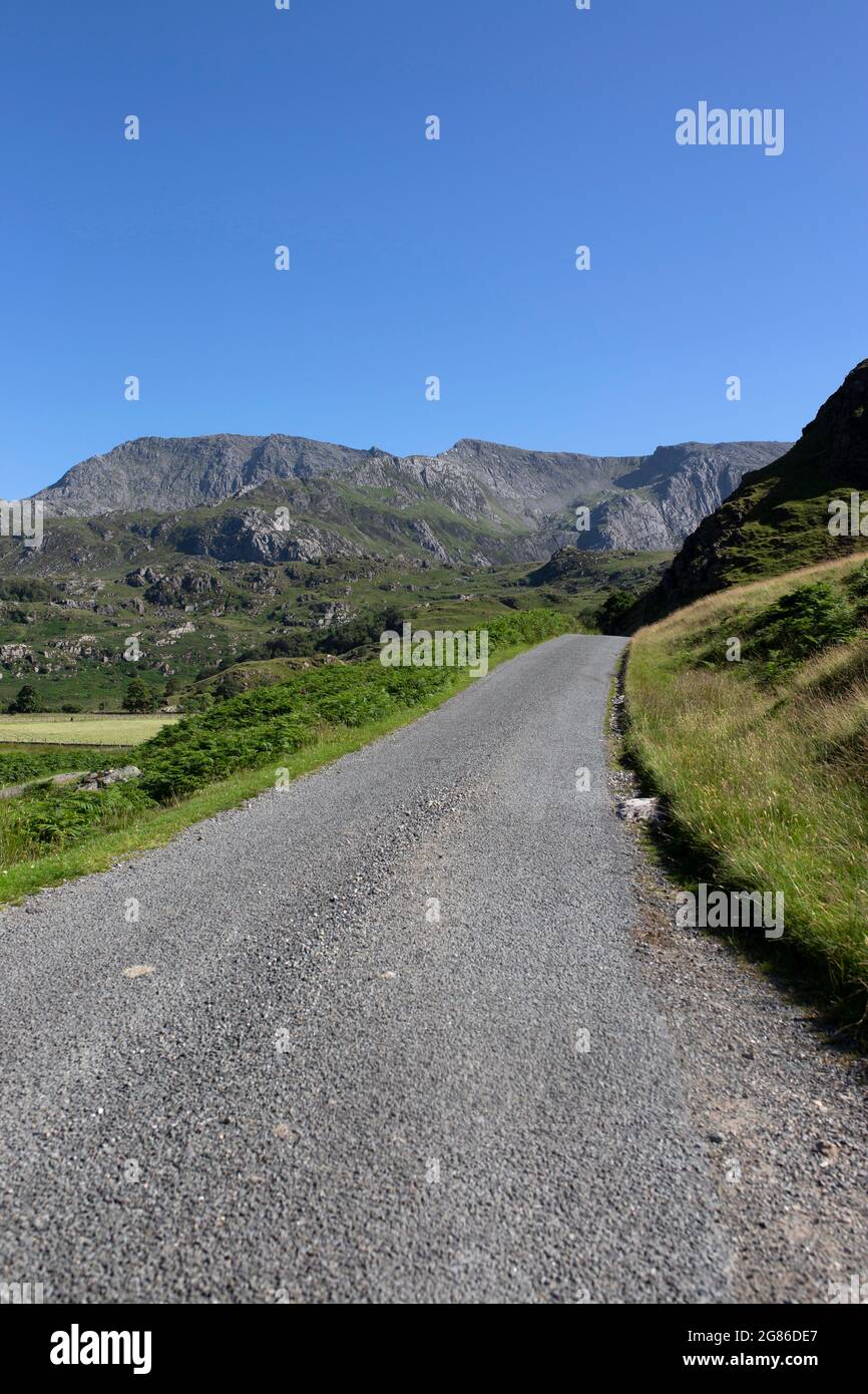 Rural road in the Nant Ffrancon Valley part of the Snowdonia National ...