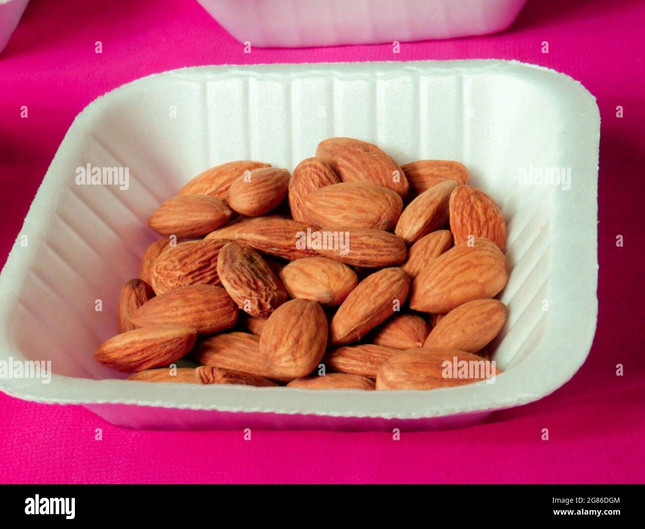 Fresh organic almond presented on fiber plate Nutrition food ...
