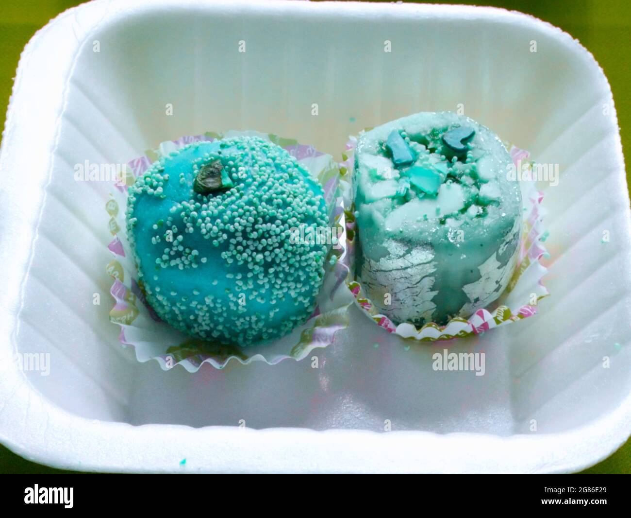 Dotted pattern turquoise color fruit flavor sweet presented on white ...