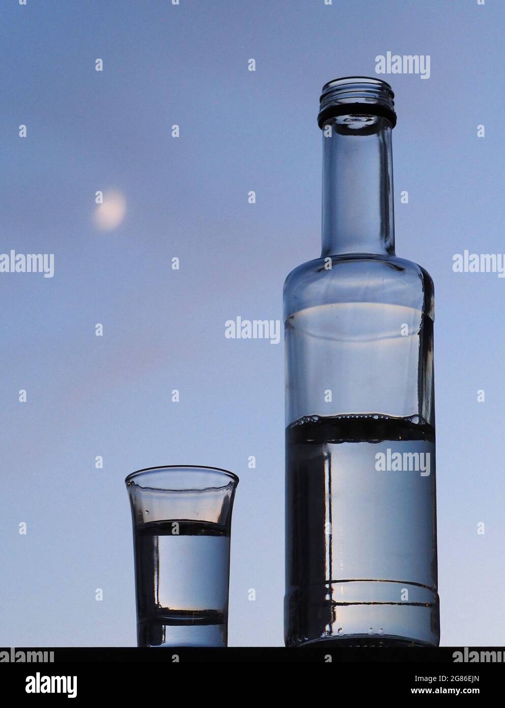 Half full bottle of vodka hi-res stock photography and images - Alamy