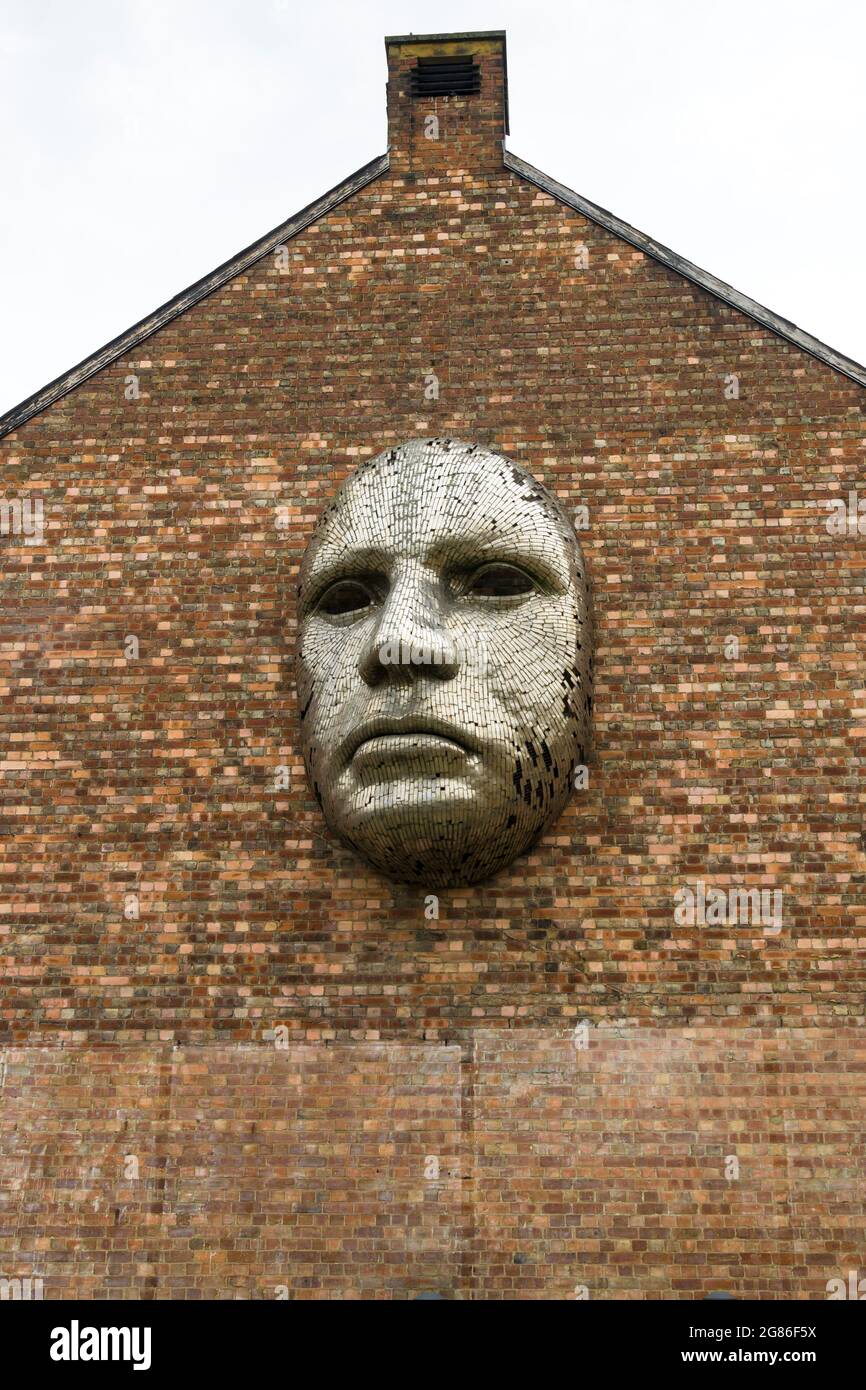 Face artwork on Lincoln Library complex wall 2021 Stock Photo - Alamy