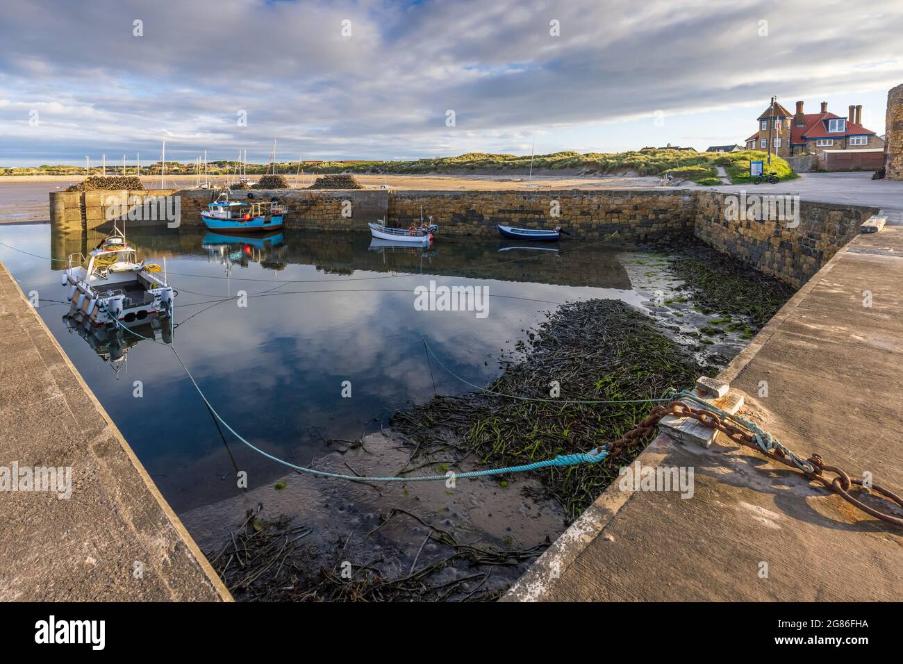 A lovely still morning with the fishing boats reflected in the harbour ...