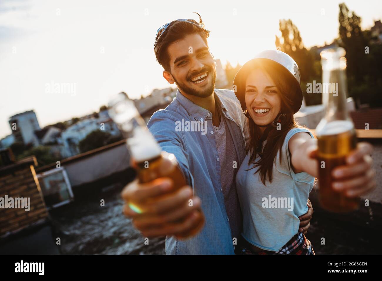 Happy cheerful couple having fun together on date outdoor Stock Photo ...