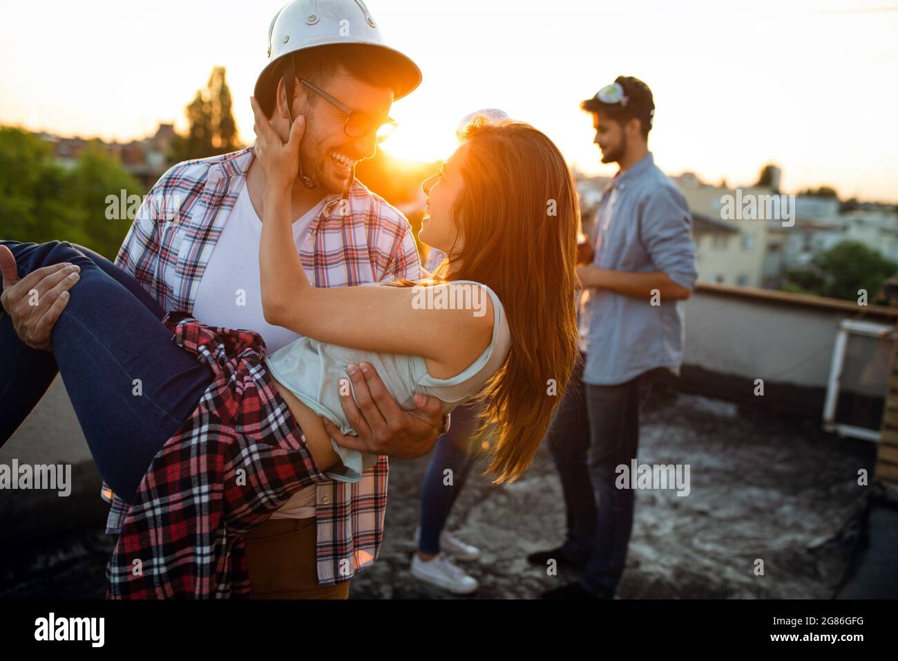 Happy cheerful couple having fun together on date outdoor Stock Photo ...