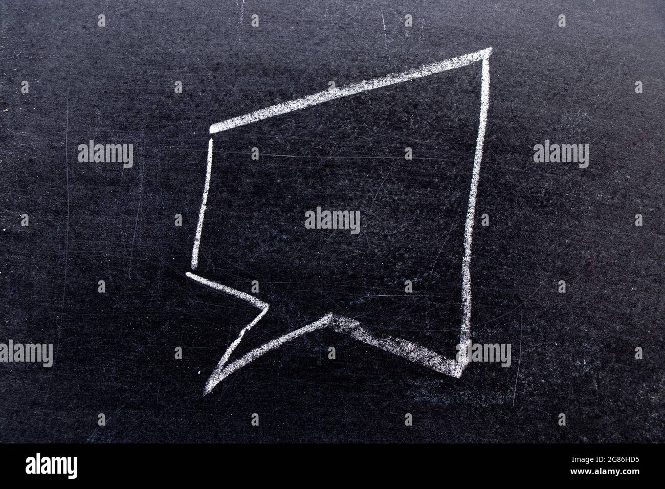 White chalk hand drawing in bubble speech shape with blank space for ...