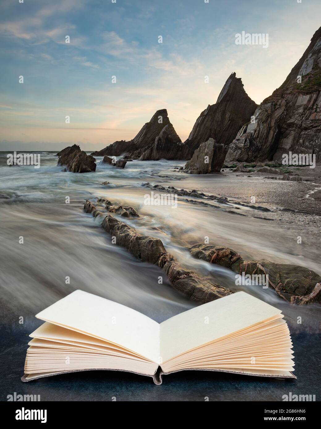 Beautiful sunset landscape image of Westcombe Beach in Devon England ...