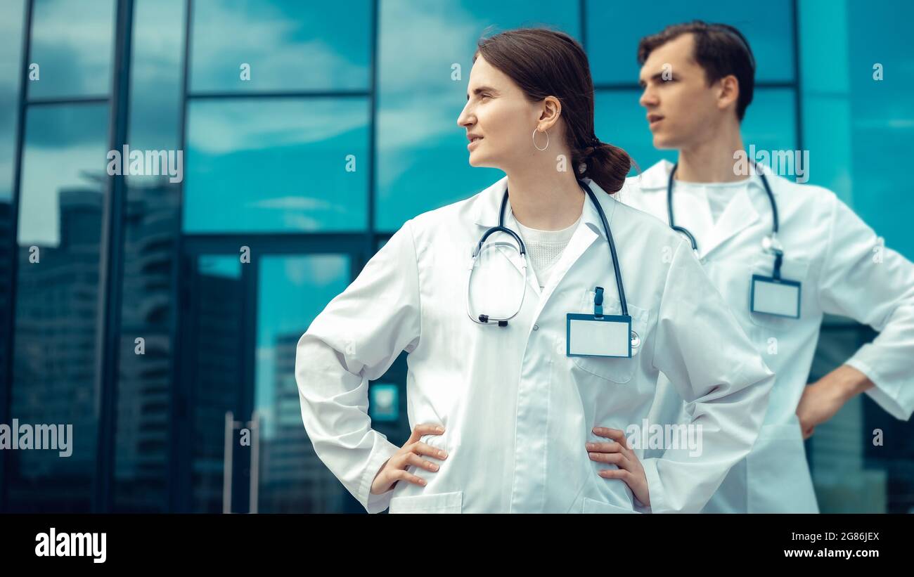 ambulance doctors standing outside the hospital building Stock Photo ...