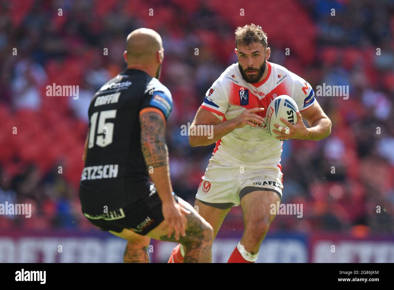 Alex Walmsley (8) of St Helens ahead of George Griffin (15) of Castleford Tigers Stock Photo - Alamy