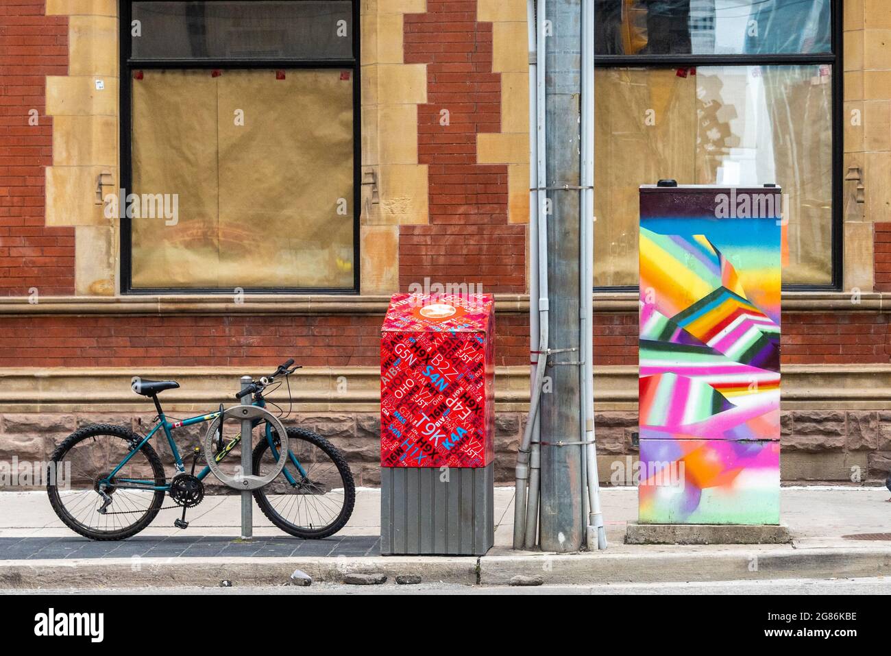 Mailbox, bicycle and urban art in stop light box, toronto, canada Stock ...