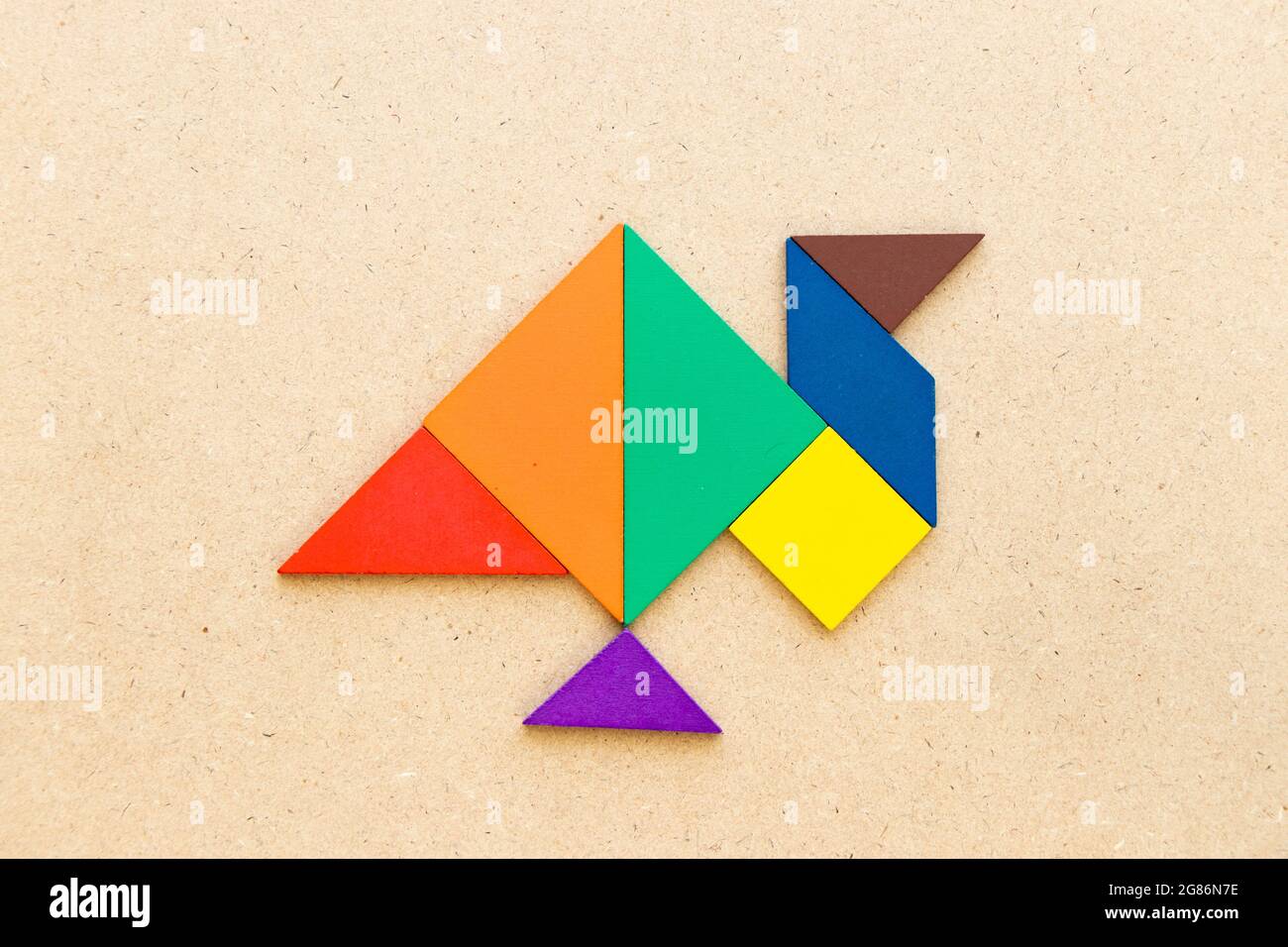 Color tangram in turkey hen or gobbler shape on wood background Stock ...