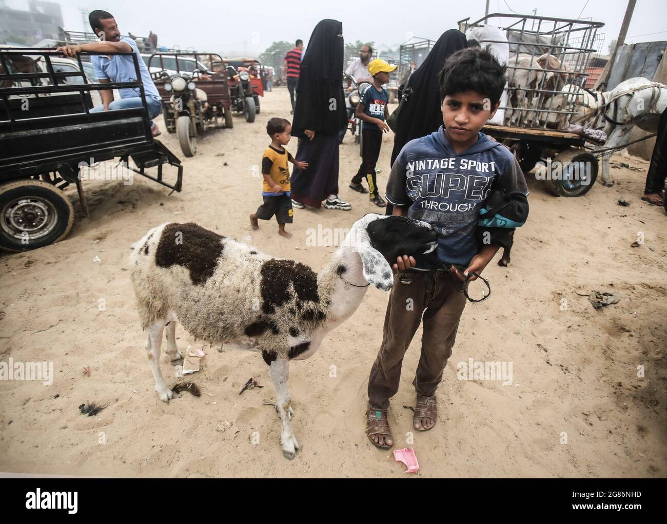 Gaza, Palestine. 17th July, 2021. A Palestinian child displays his ...