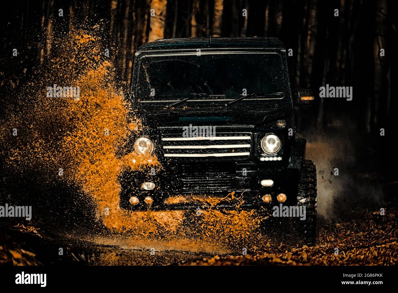 Mud and water splash in off-road racing. Off the road travel on ...