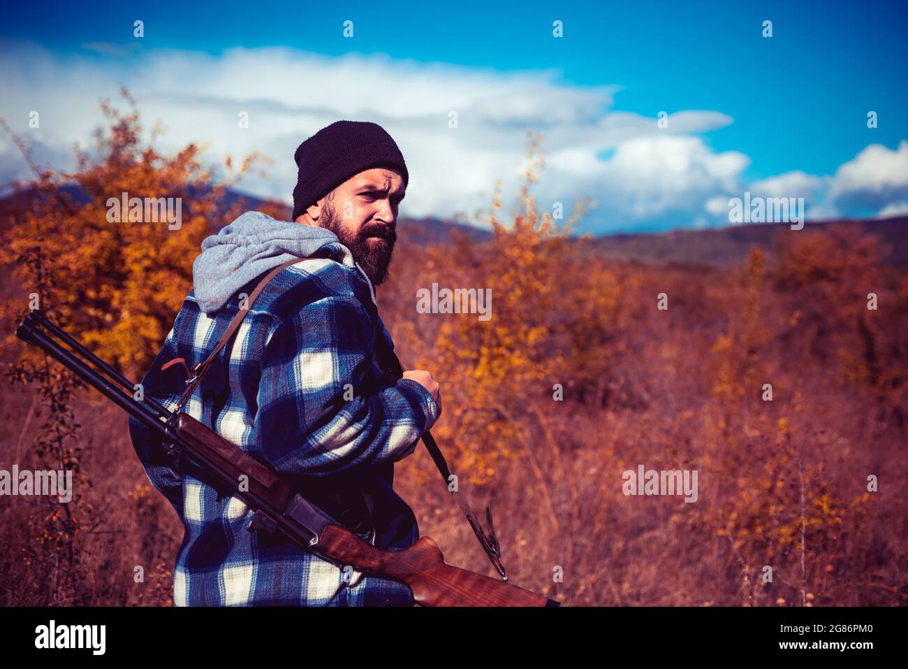 Vintage hunter. Hunting without borders. Hunter with shotgun gun on ...