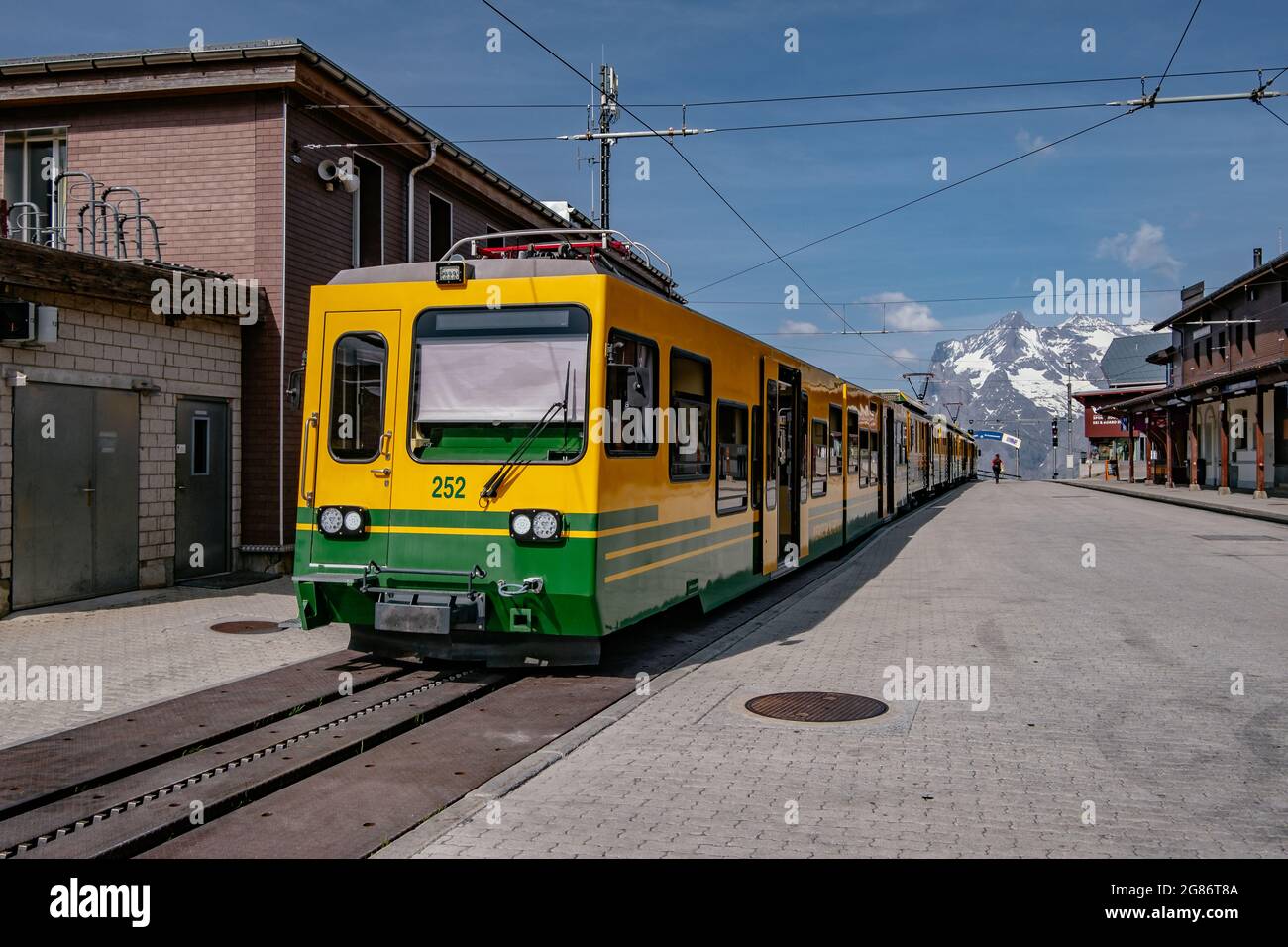 Train to Grindelwald in Kleine Scheidegg Railroad Station with Swiss ...