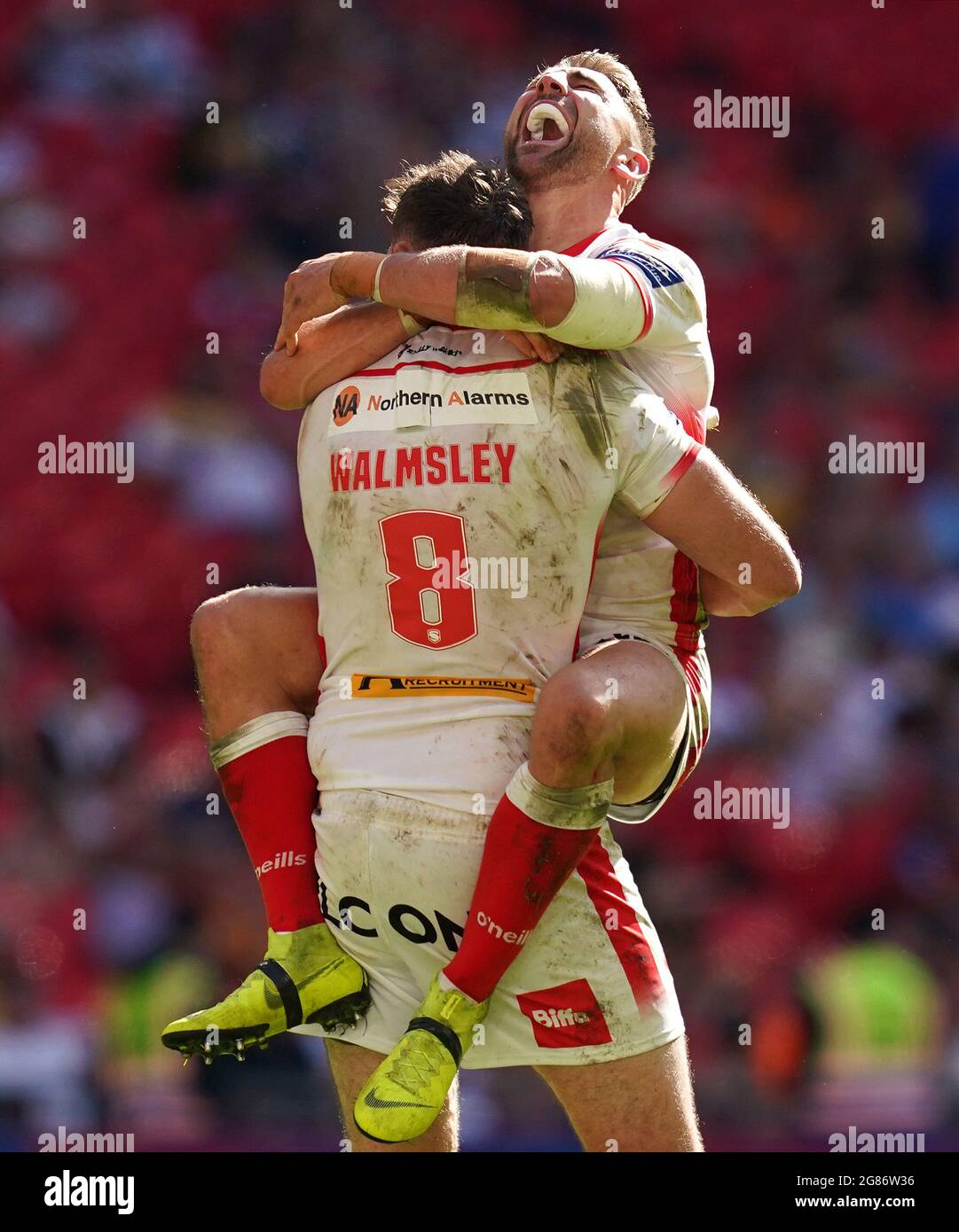 St Helens' Tommy Makinson (right) and Alex Walmsley celebrate just ...