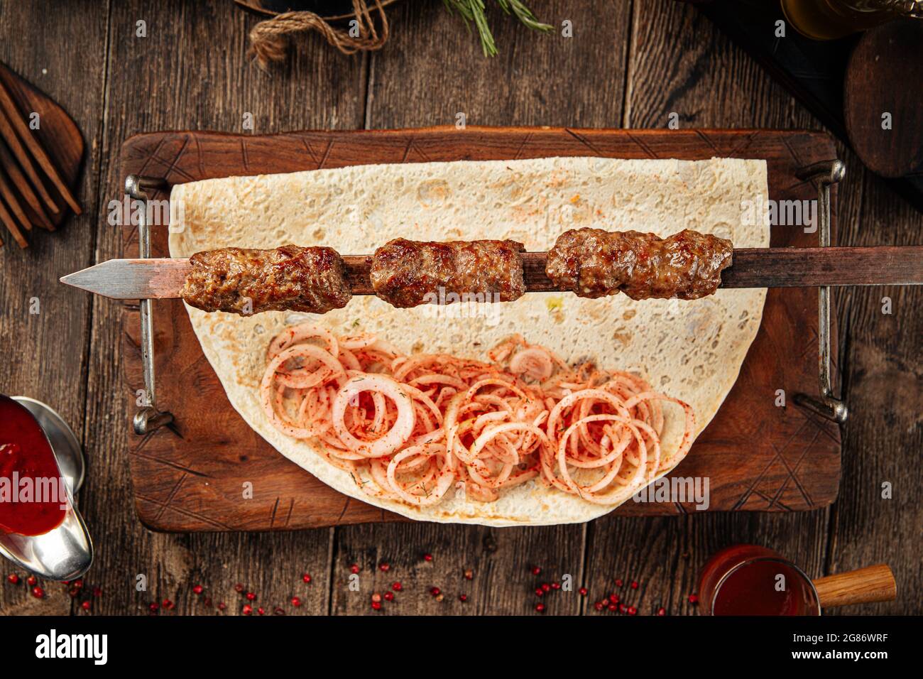 Caucasian beef lyulya kebab with marinated onion Stock Photo - Alamy