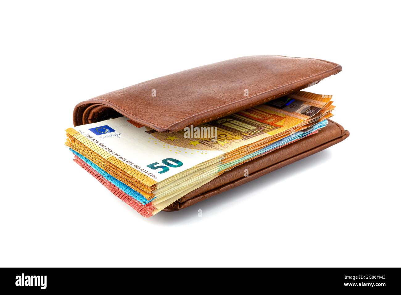 Brown leather mens wallet with a stack of Euro banknotes inside ...