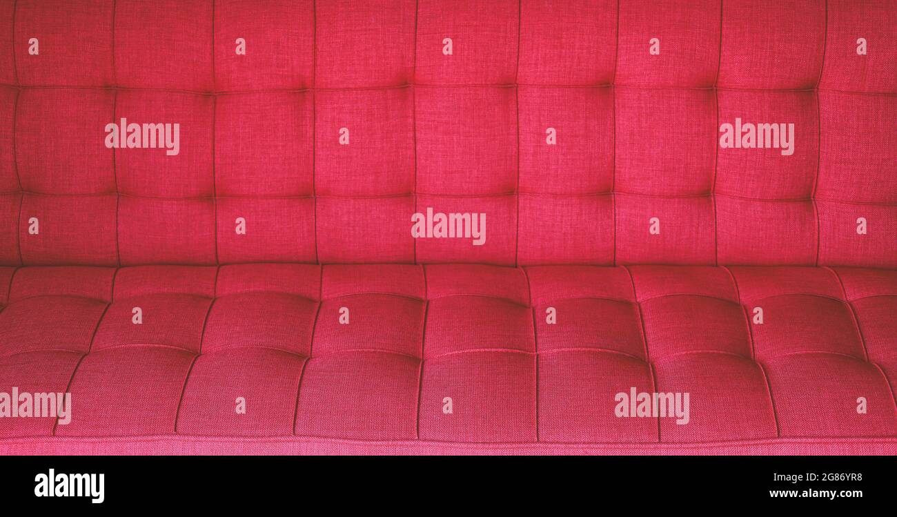 Texture details of red cover soft cotton cloth fine sewing sofa. Fabric ...