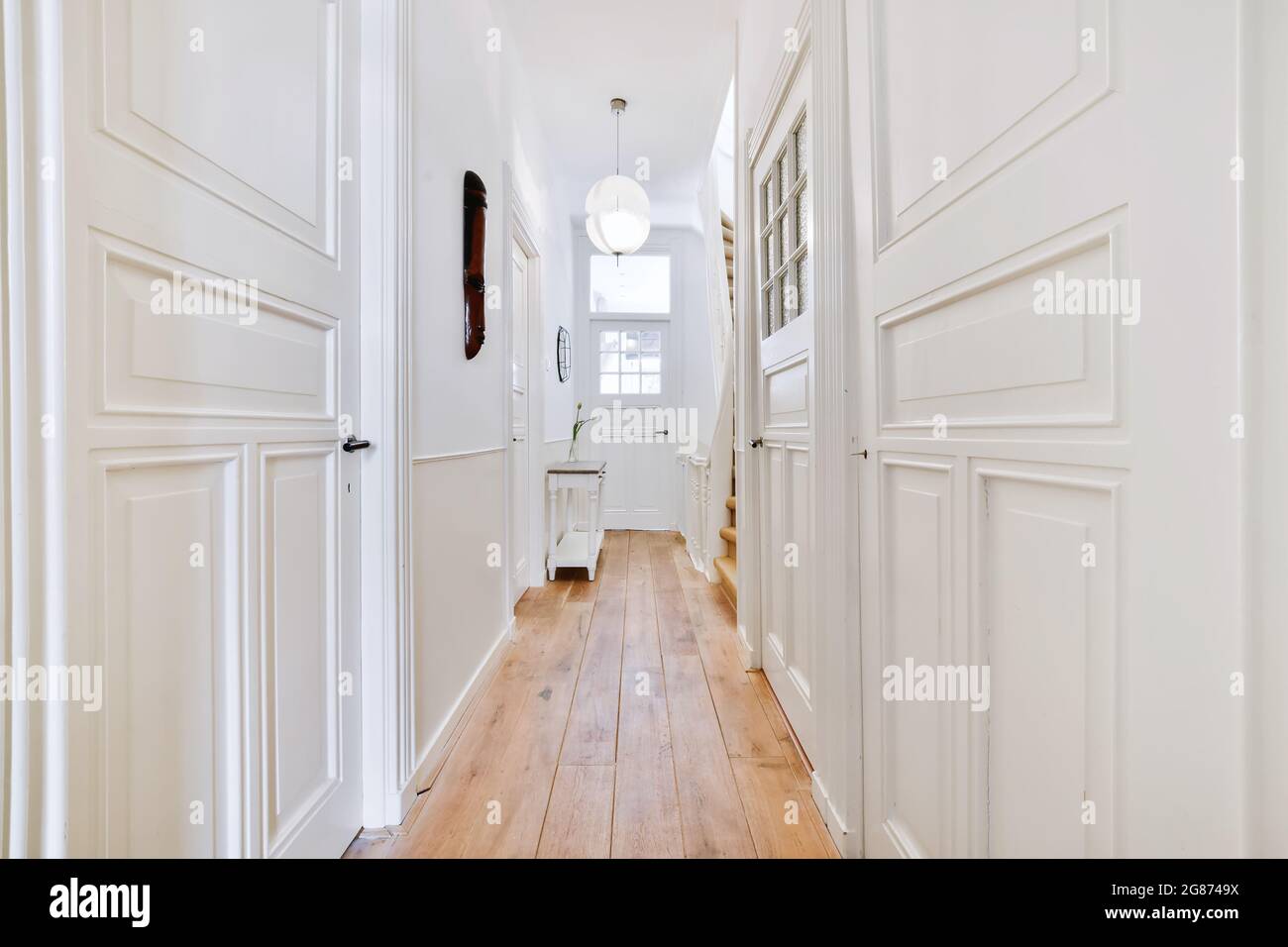 A long empty corridor designed in minimalistic style Stock Photo - Alamy