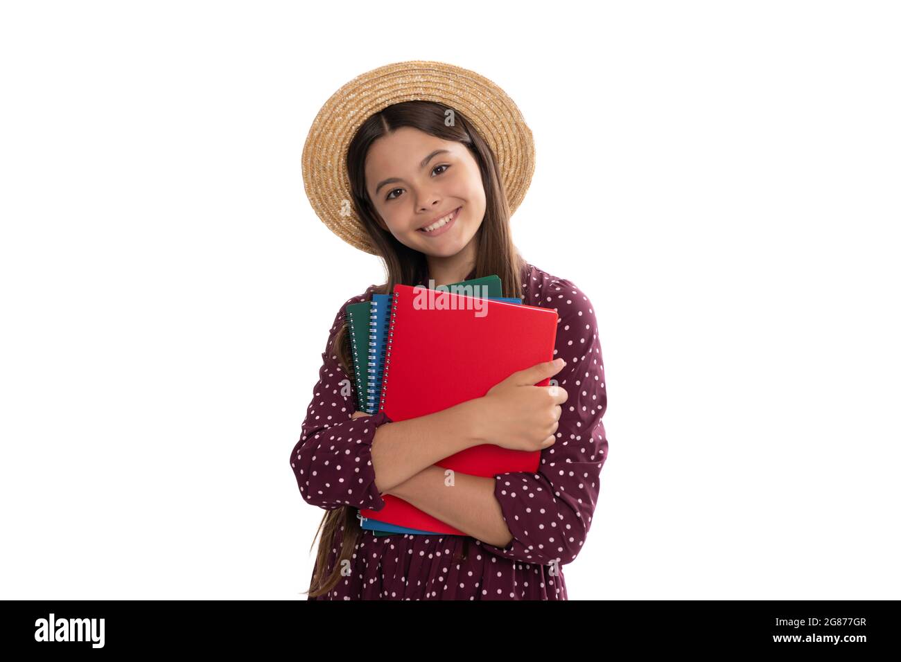 happy cute teen girl in straw hat hold school workbook for studying ...