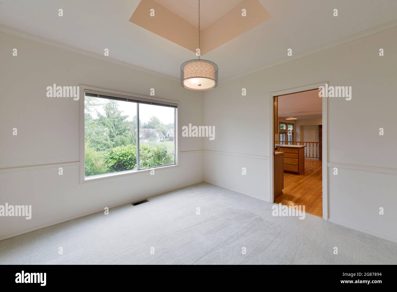 Modern residential empty dining room interior Stock Photo - Alamy