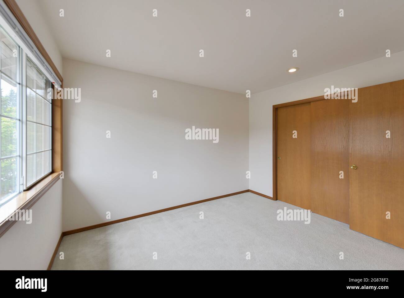 Modern residential empty bedroom interior Stock Photo - Alamy