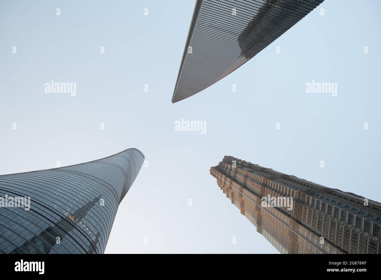 Low angle of modern tall skyscrapers on a clear blue sky Stock Photo ...