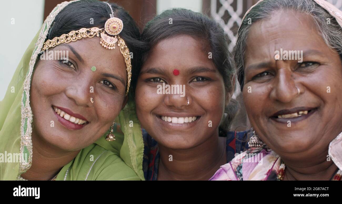 Three generations of authentic South Asian women in traditional ...