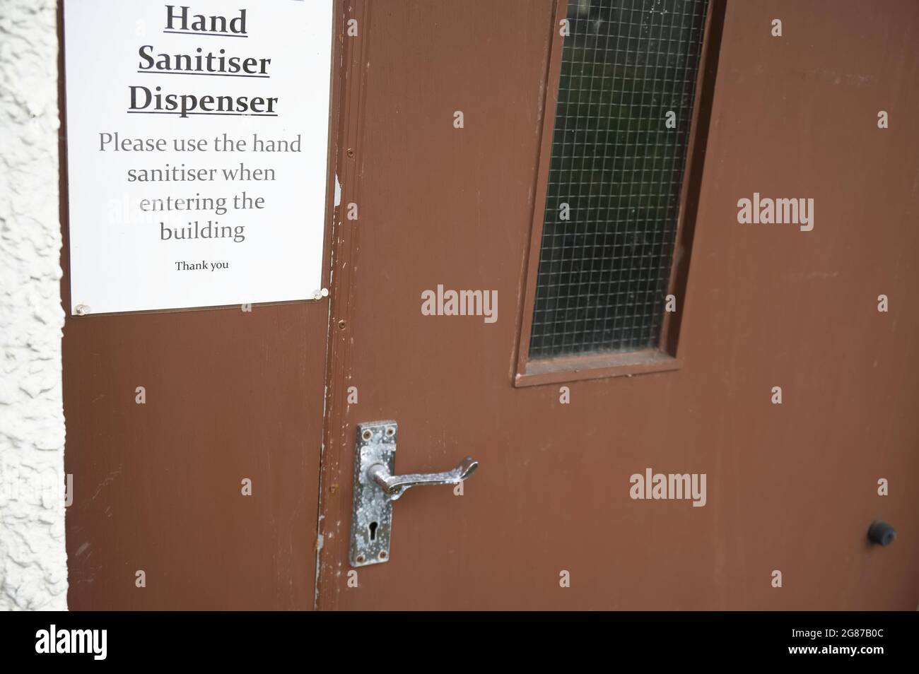 Hand sanitiser dispenser for customer use to wash hands reduce risk of ...