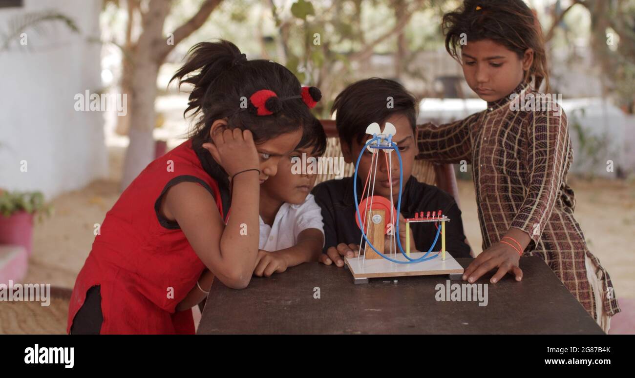 Group of South Asian children playing with educational toys Stock Photo ...