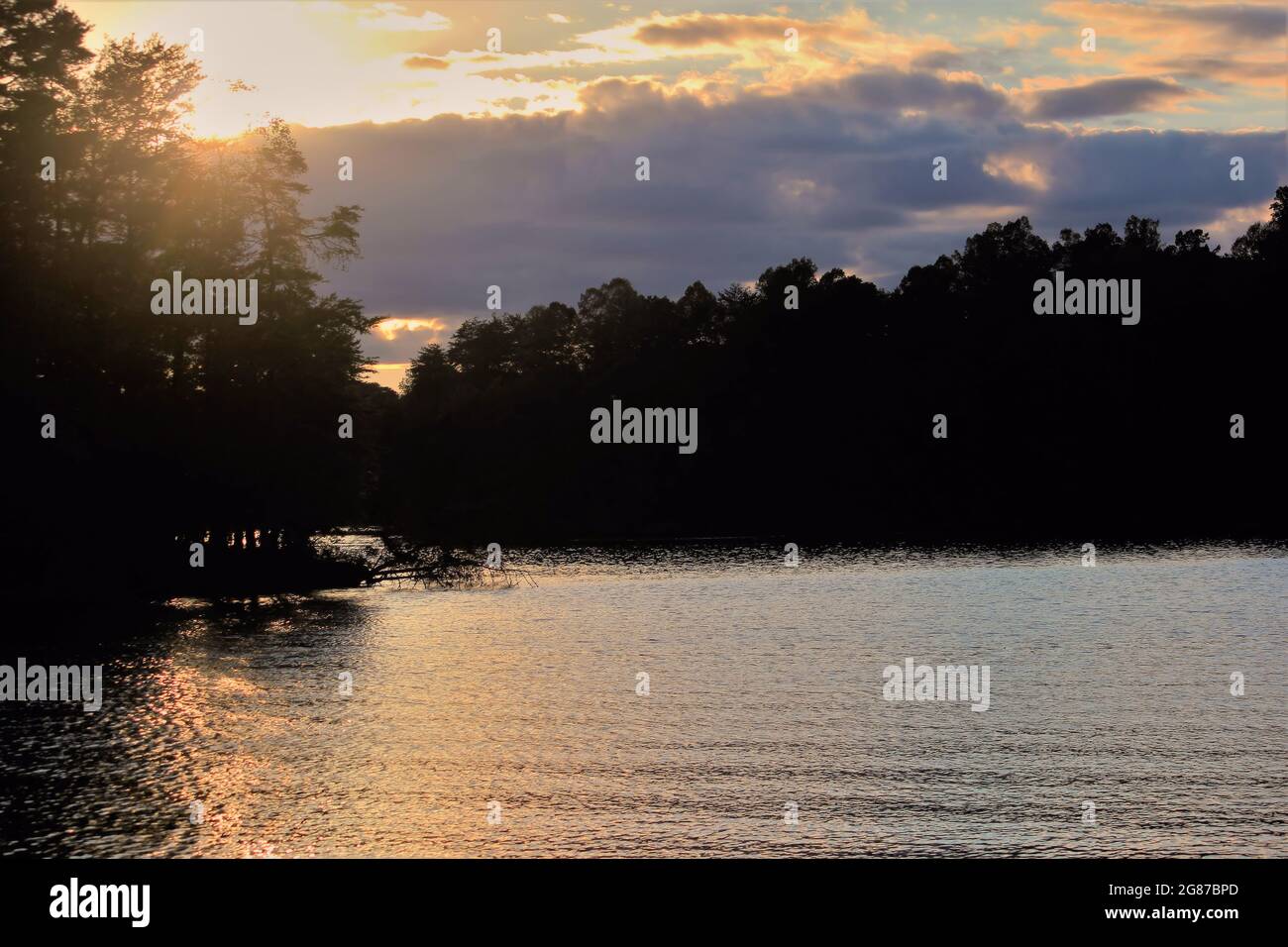 Early evening blue sky over a lake hi-res stock photography and images ...